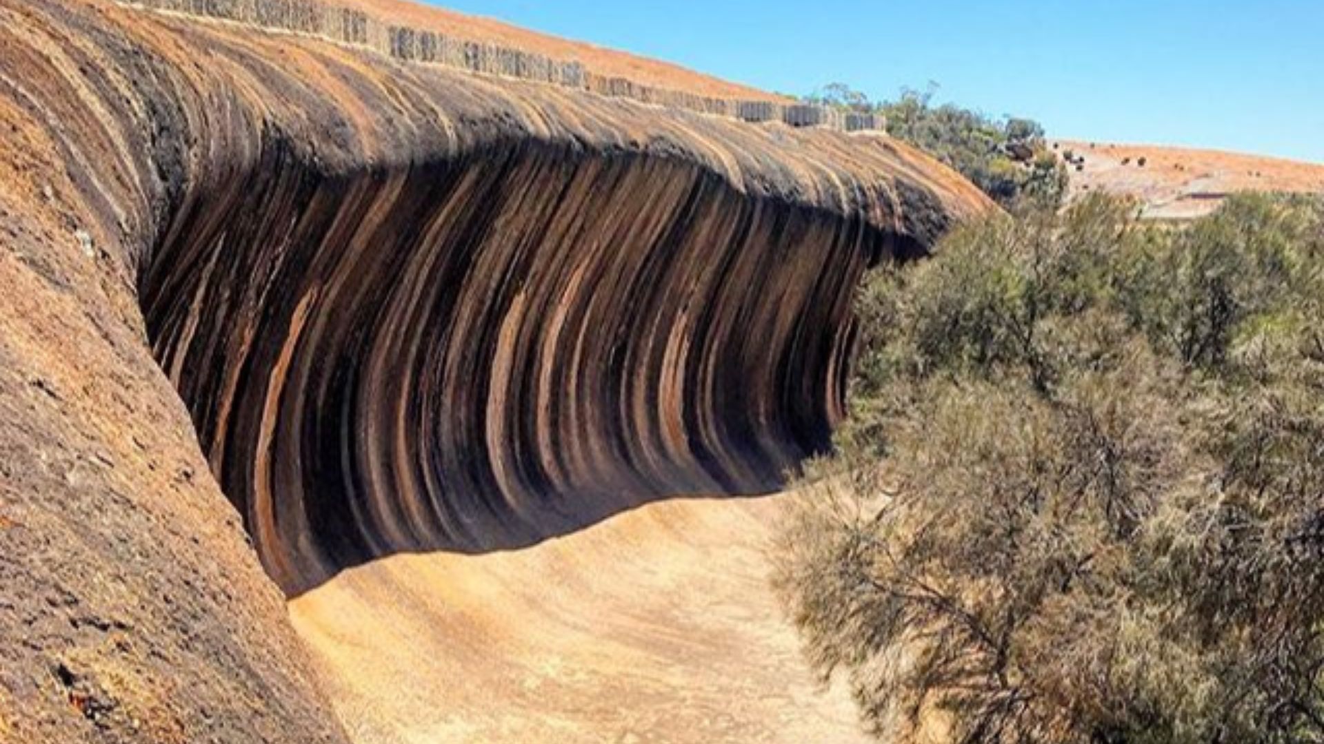 Australia's mind-bending Wave Rock is one of the few great ancient ...