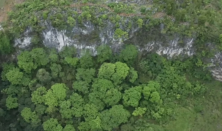 After a 630-foot sinkhole opened up in China, the first explorers to ...